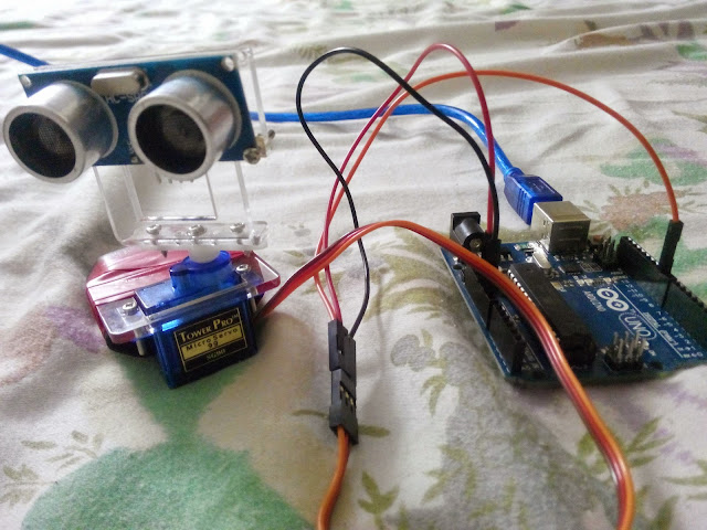 Histology Slides Database: Arduino with microservo & ultrasonic sensors