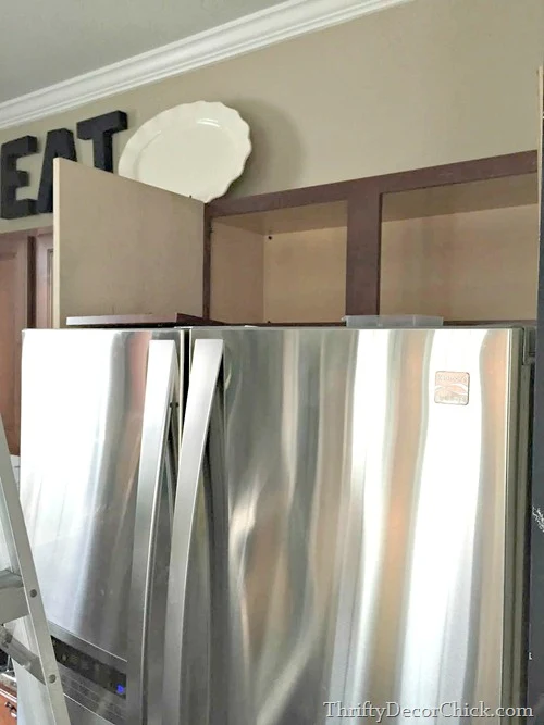 Building in a fridge with cabinet on top | Thrifty Decor Chick ...