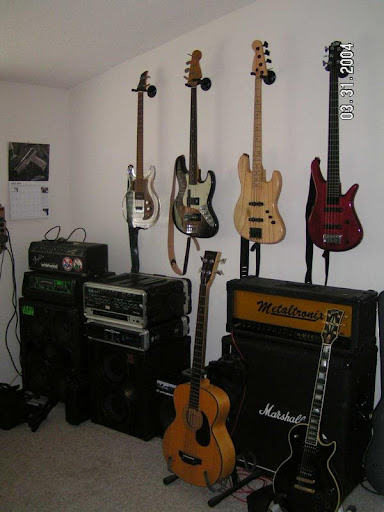 The official show your basses hanging on a wall thread! - Bass Guitar ...