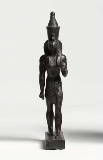 Statuette of Horus, divine representation of the Pharaoh, wearing the ...