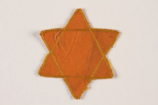 Yellow cloth Star of David badge with a blank center — Google Arts ...